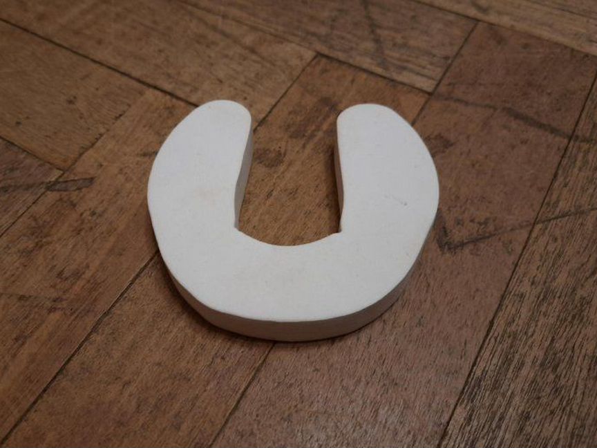 Фиксатор для двери белый