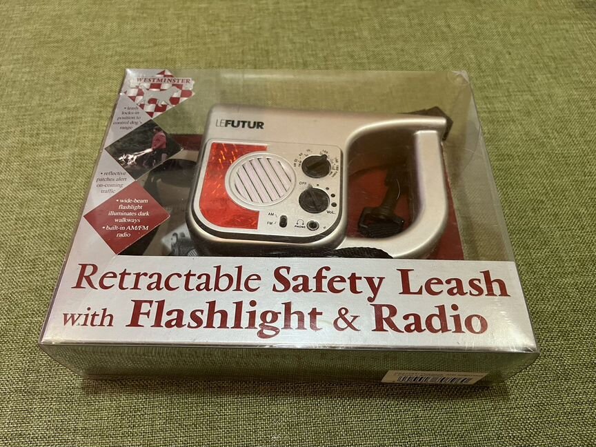 Поводок-рулетка с радио и фонарем